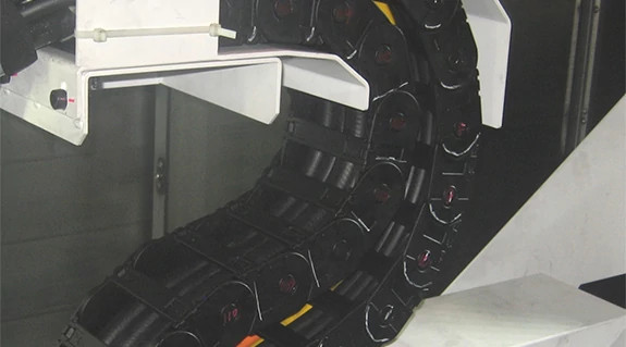 Parallel running energy chain solves space problem in machine tool ...