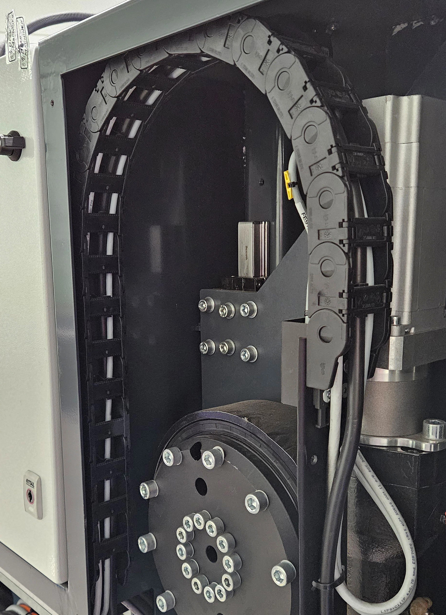 e-chains and cables in a machine for regrooving truck tires.