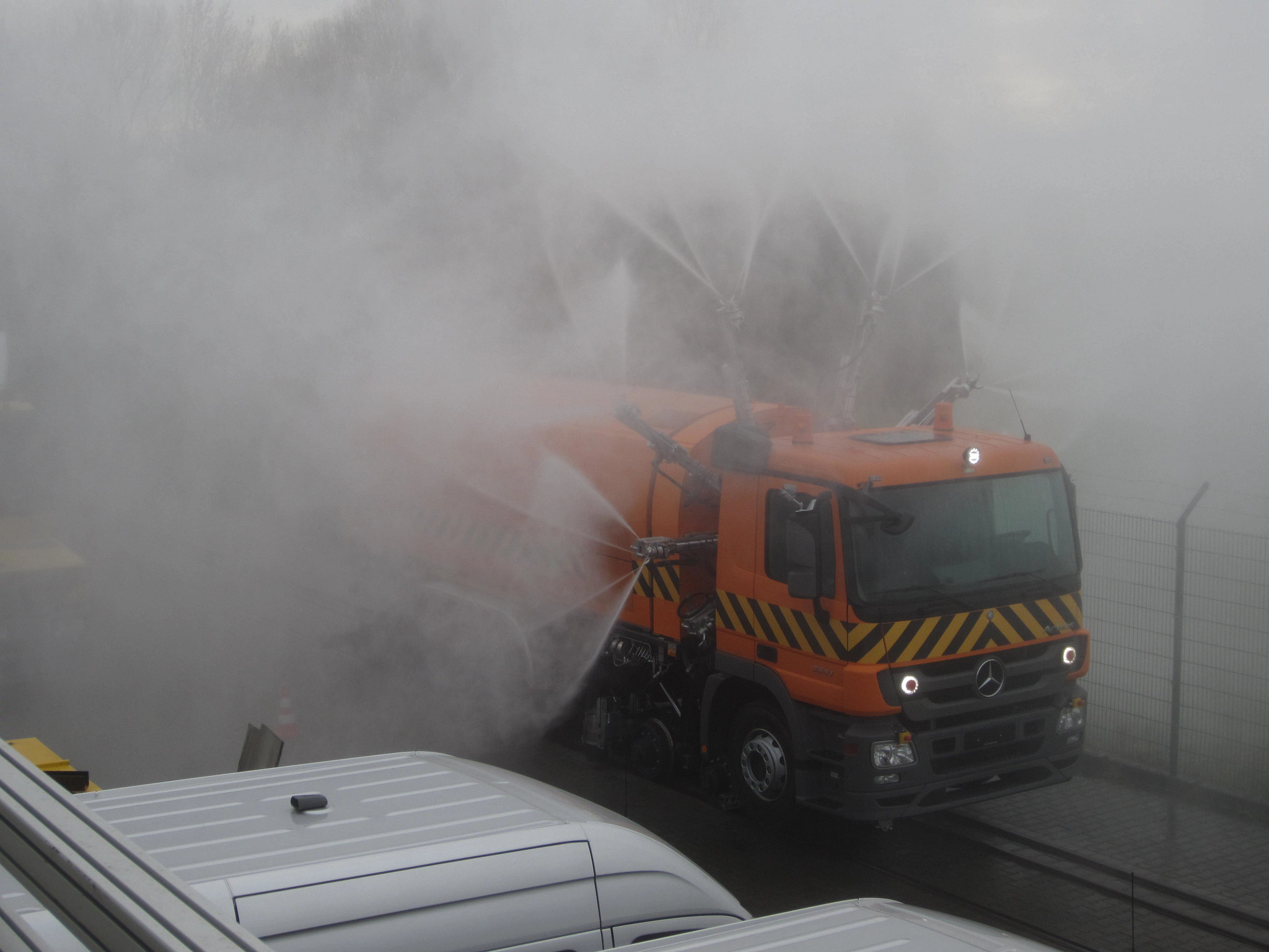 Linear bearings in vehicle for track and tunnel cleaning