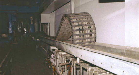 Energy chains replace trailing cables on bridge crane in concrete plant ...