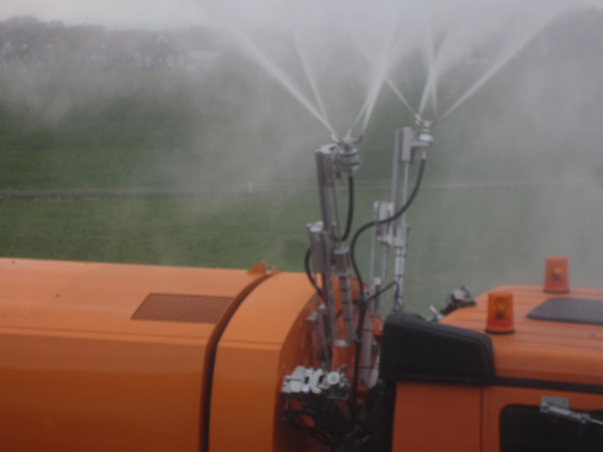 Linear bearings in vehicle for track and tunnel cleaning