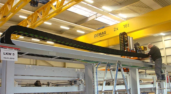 AX energy chains defy swarf in wood processing | igus Australia