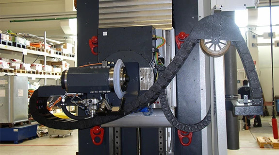 energy supply in gear grinding machine with tight installation space ...